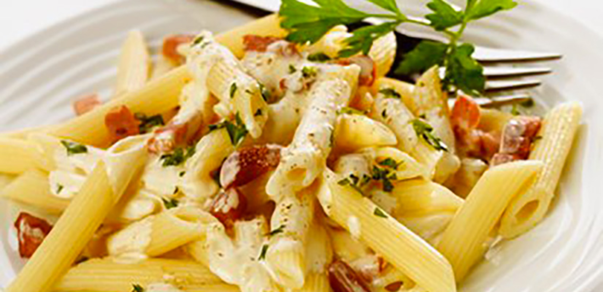 Pâtes aux lardons et fromage de chèvre frais - Recette au fromage